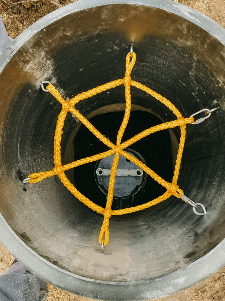 What is a septic tank riser?